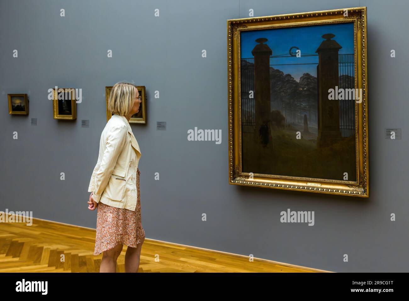 Visitor in Albertinum Dresden looking at painting by Caspar David ...