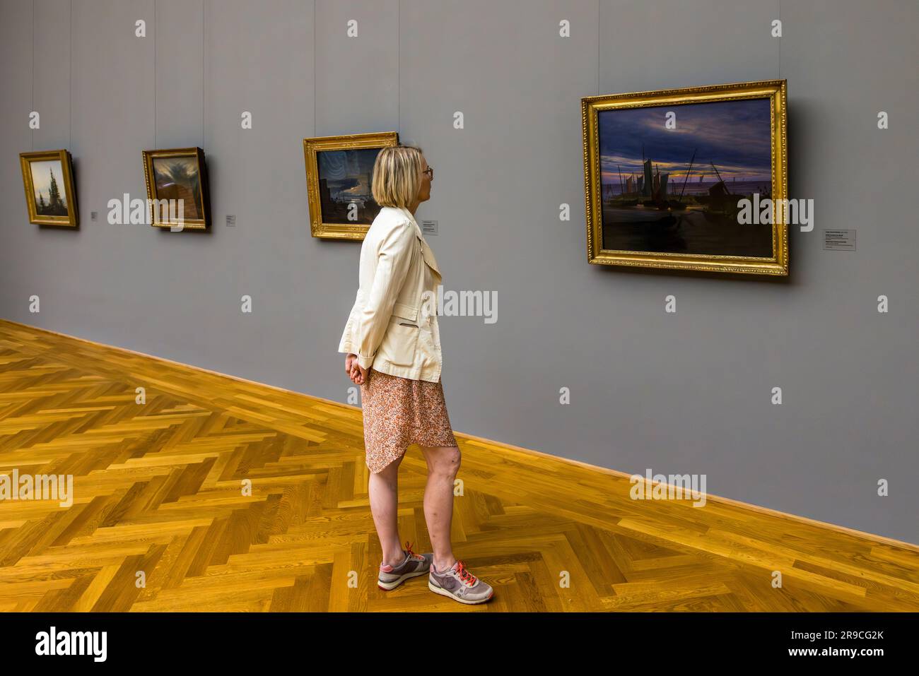 Visitor in Albertinum Dresden looking at painting by Caspar David ...
