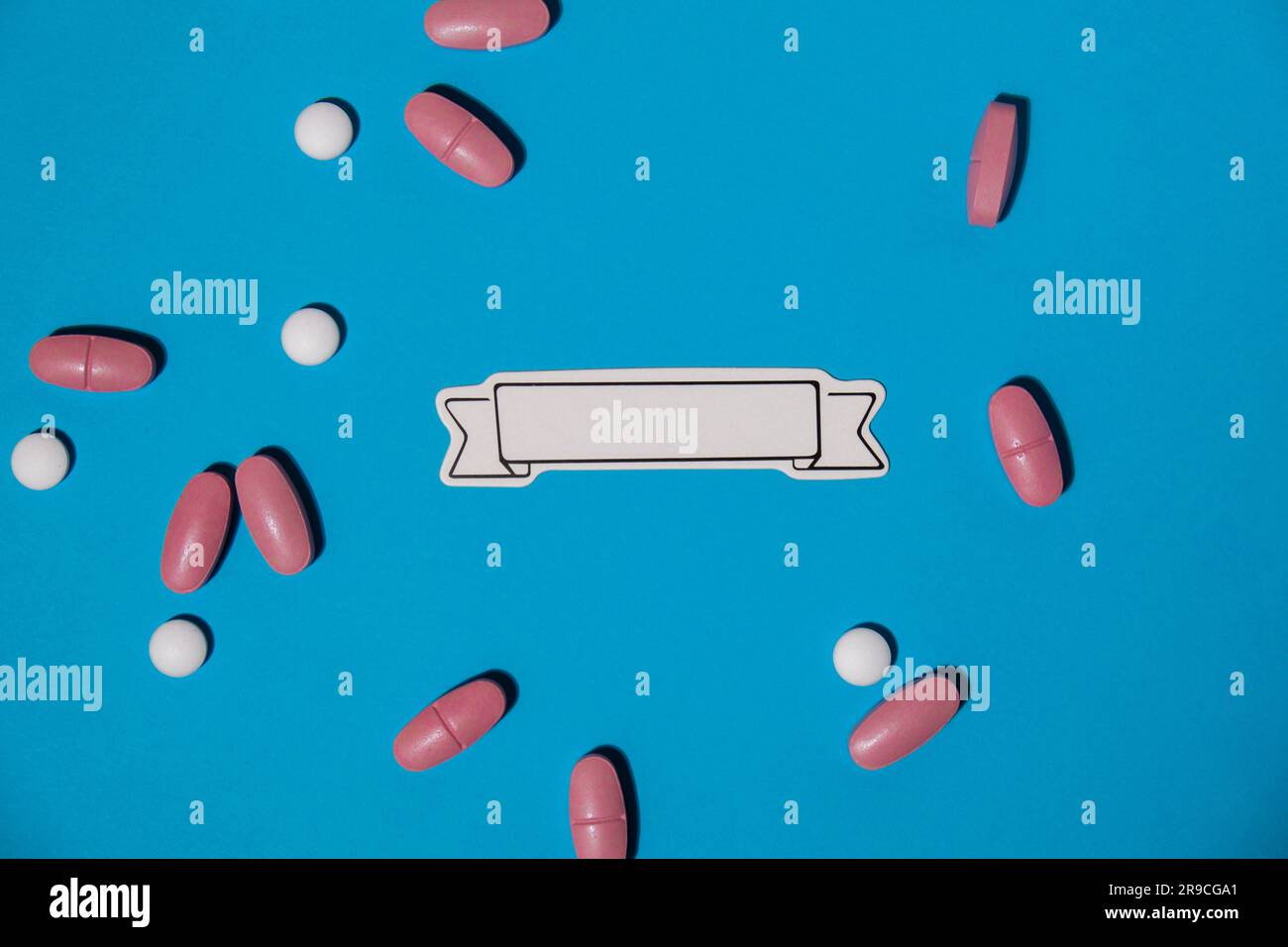 Closeup of doses of tablets for daily take medicine with white pink ...
