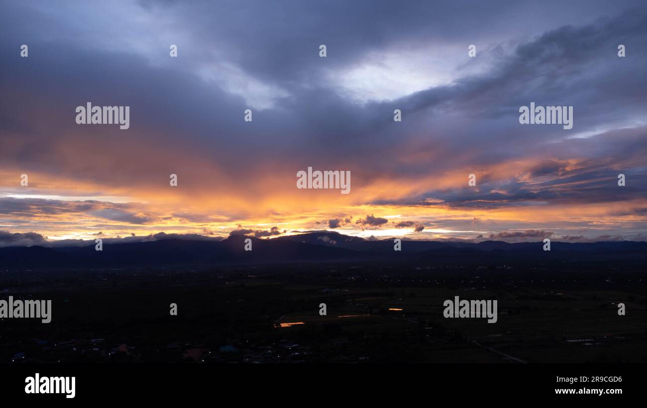 Real amazing sunrise or sunset sky with gentle colorful clouds ...