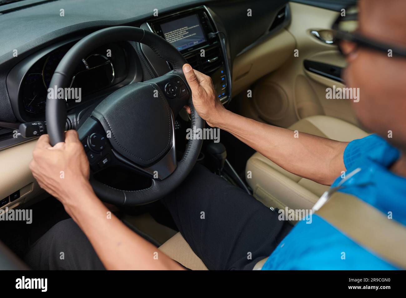 Black man driving car to work in the morning Stock Photo - Alamy