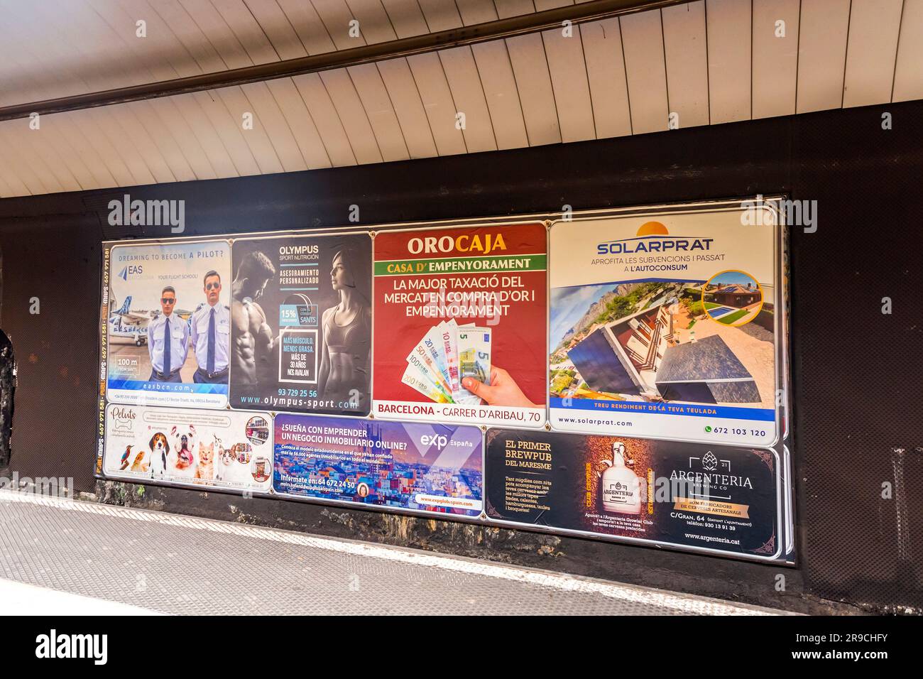 Barcelona, Spain - FEB 13, 2022: :Advertisement posters in Spanish and ...