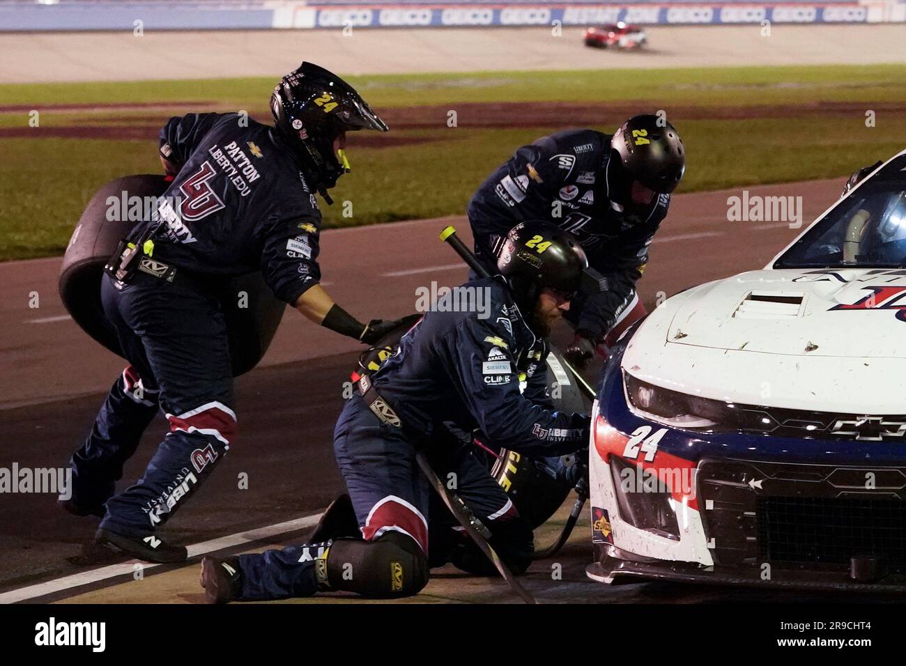 The pit crew works on William Byron's car during a NASCAR Cup Series ...