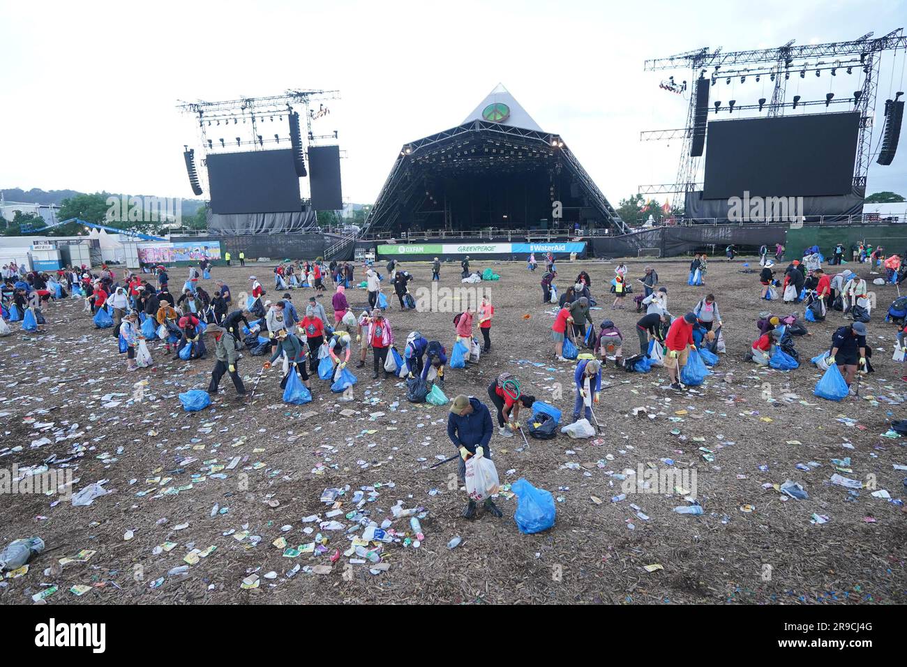 People seen during the clean up operation at the Glastonbury Festival ...