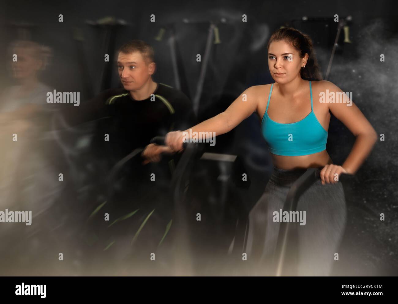 Group of people performs aerobic training workout cardio routine on ...