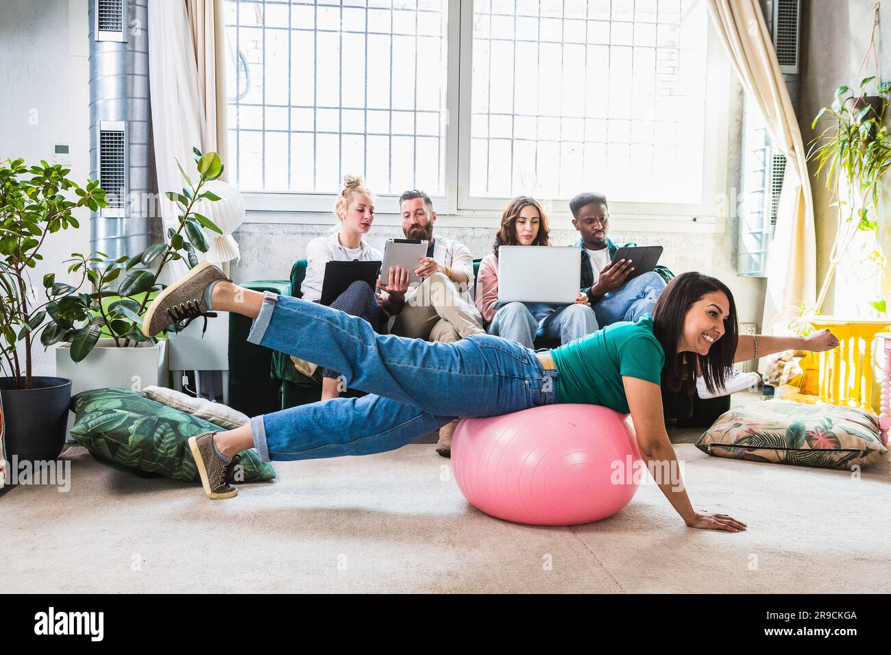 Bizarre and funny scene with boys studying on the computer and a girl ...