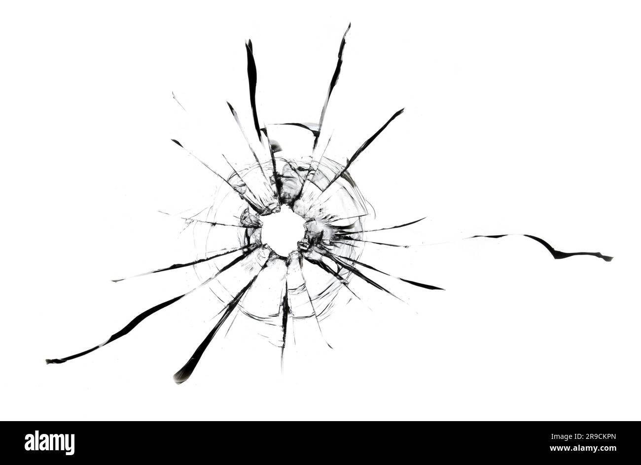 Texture of glass cracks from a gun shot. Bullet hole in window ...