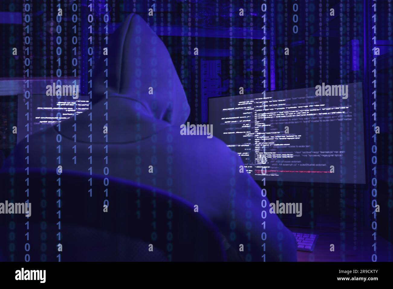 Cyber attack. Hacker working with computers and breaking system to steal information in dark ...