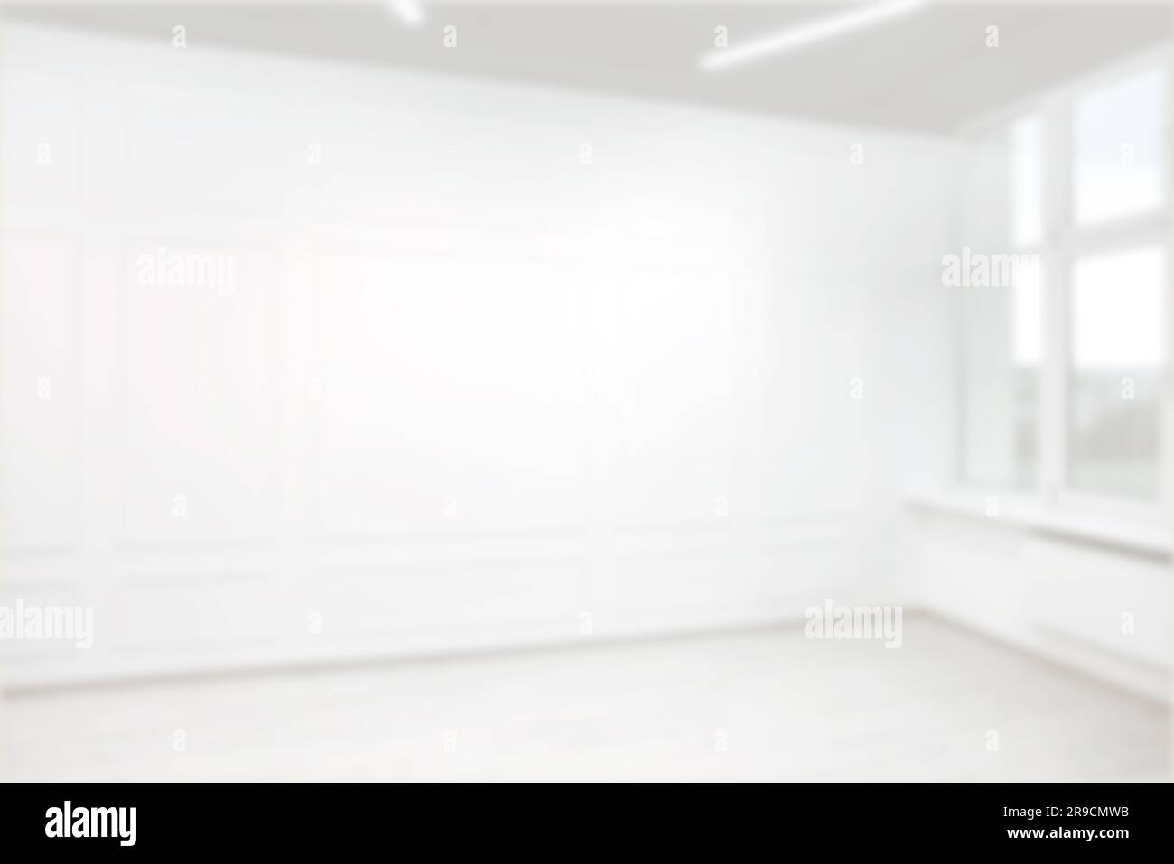 Empty room with white wall and window, blurred view Stock Photo - Alamy