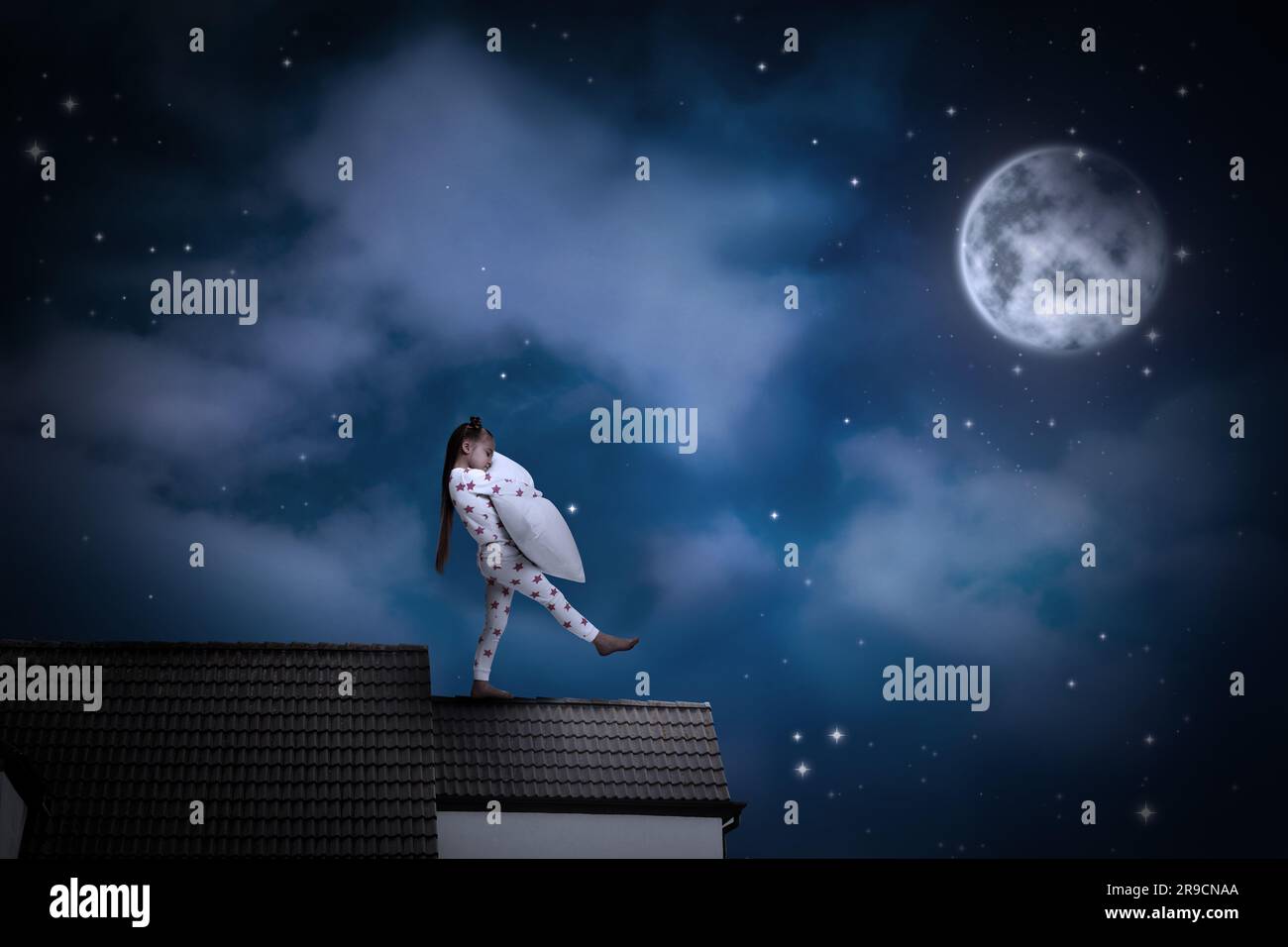 Girl hugging pillow and sleepwalking on roof under starry sky with full ...
