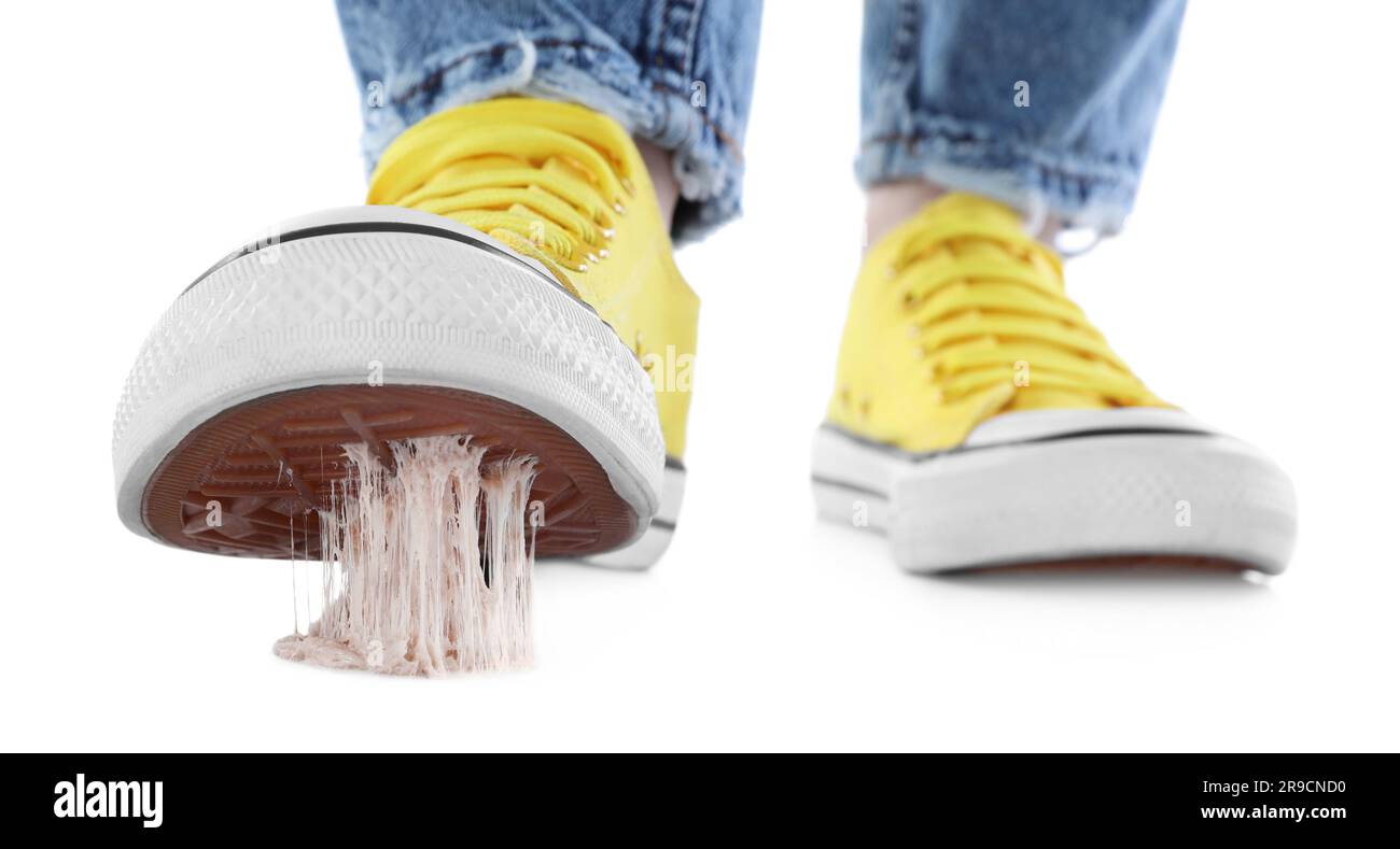 Person stepping into chewing gum on white background, closeup Stock ...