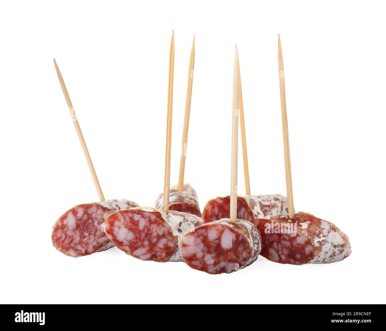 Toothpick appetizers. Tasty sausage pieces on white background Stock ...