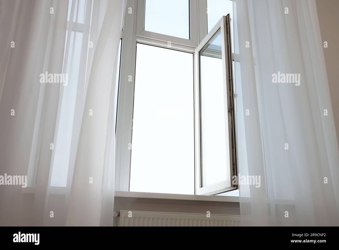 Open window and elegant white curtains indoors. Interior design Stock ...