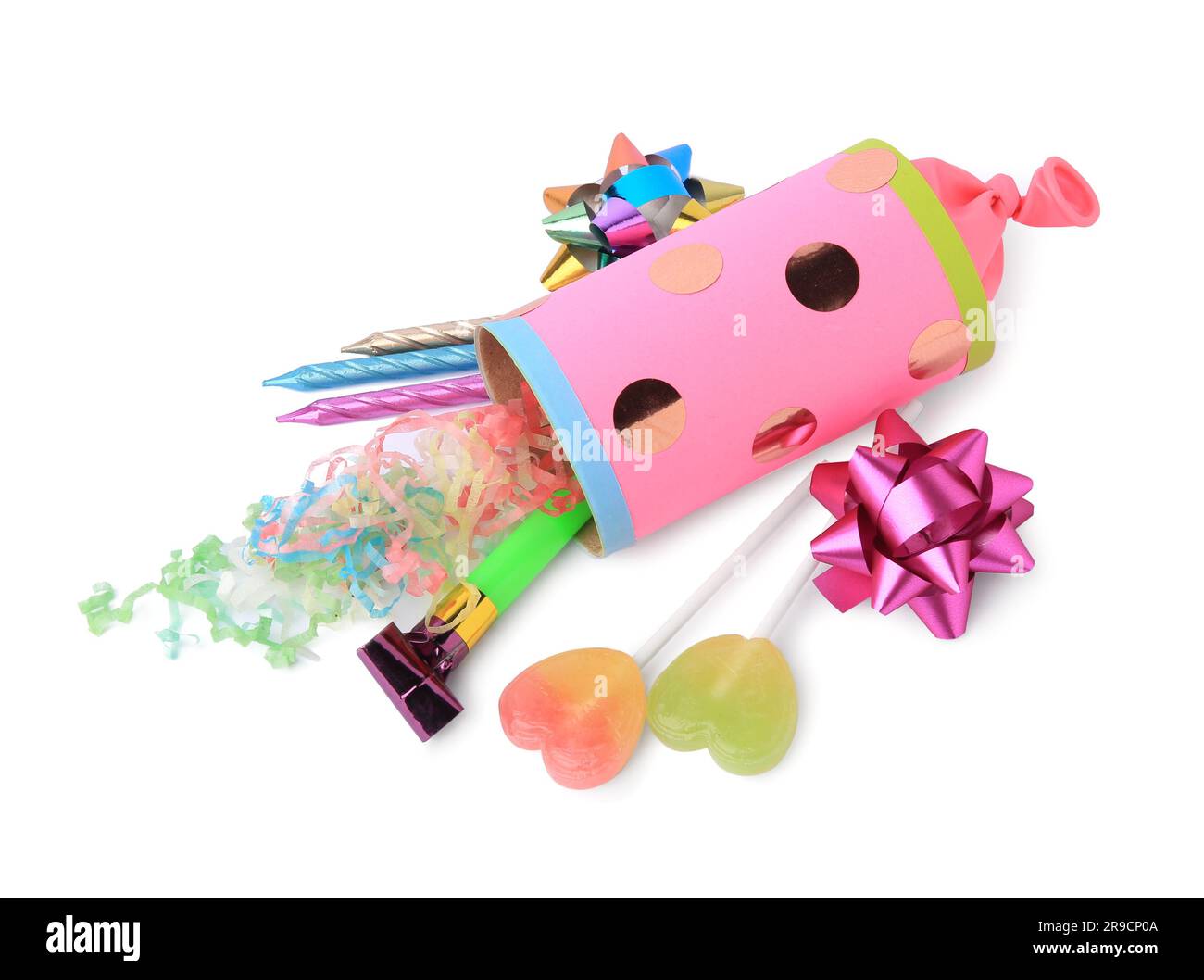 Party cracker and different festive items isolated on white, top view ...