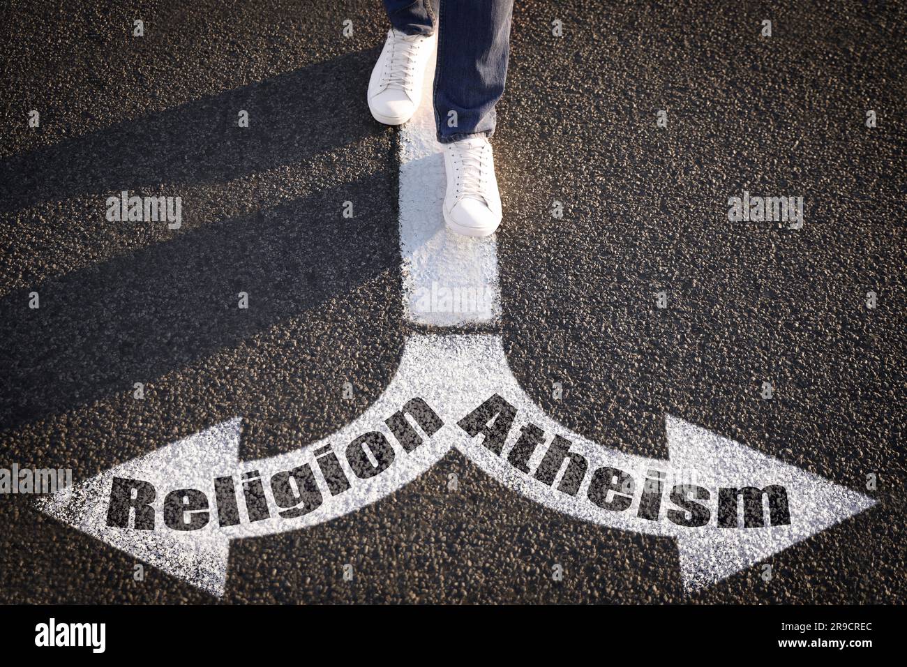 Choice between atheism and religion. Man walking towards drawn marks on ...