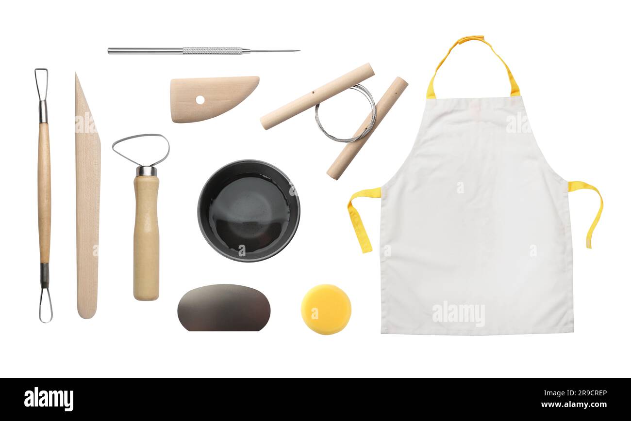 Set of pottery tools, apron and ceramic bowl on white background Stock ...