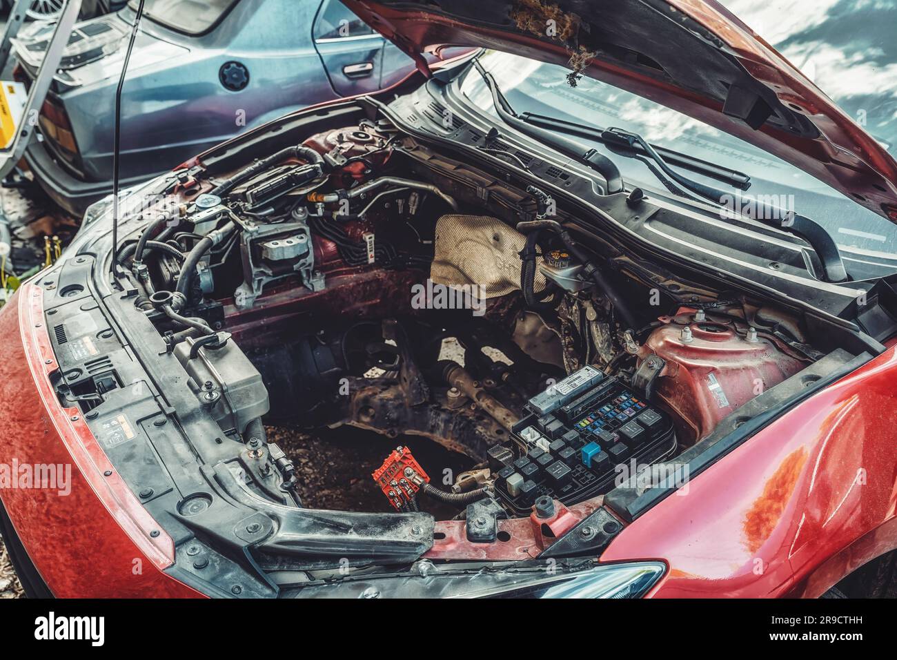 red car with removed engine Stock Photo - Alamy