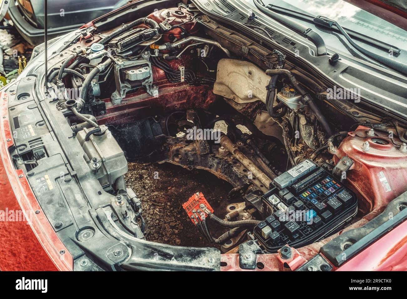 red car with removed engine Stock Photo - Alamy
