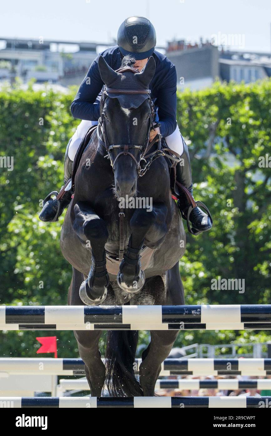 Roger Yves Bost riding Delph de Denat HDC during the Longines Paris ...