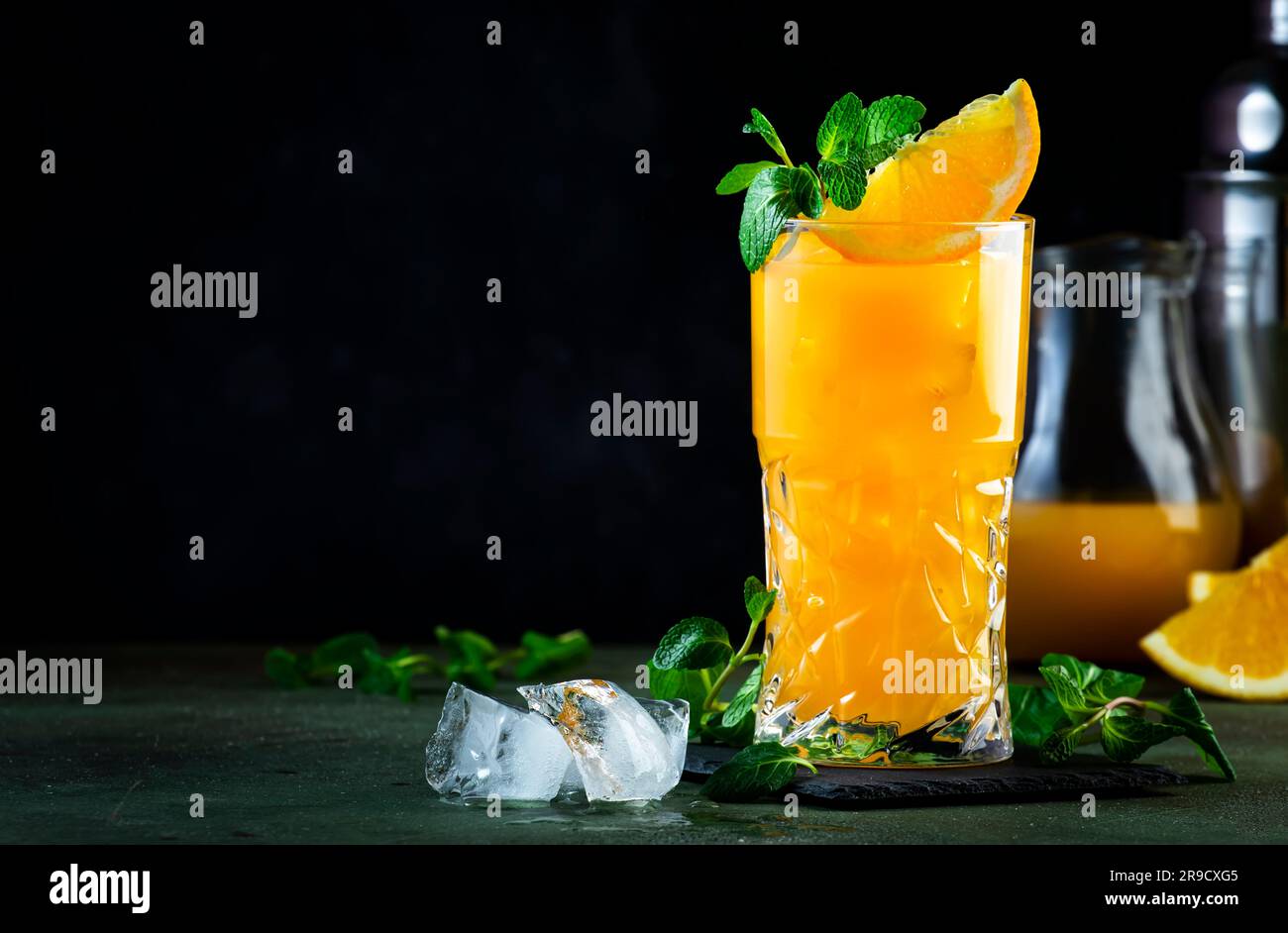 Screwdriver, alcoholic cocktail drink with vodka, orange juice and ice ...