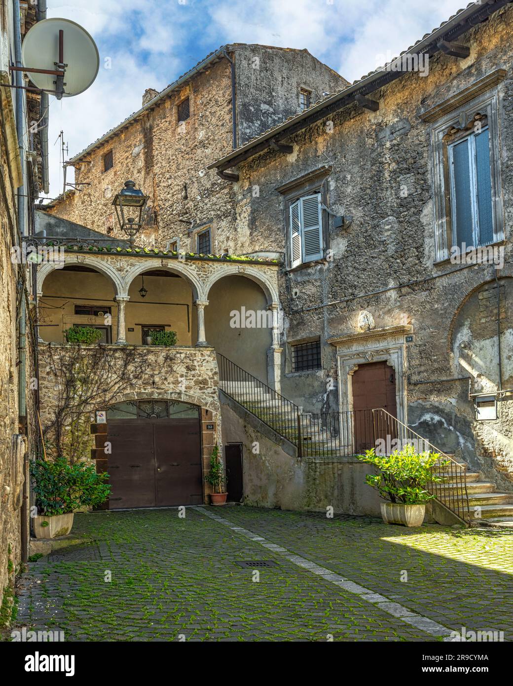 Glimpse of one of the many medieval palaces with private courtyards and ...