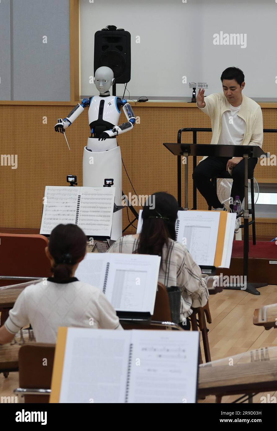 26th June, 2023. Robot conductor Conductor Choi Soo-yeol (R) and "EveR 6," a robot conductor ...
