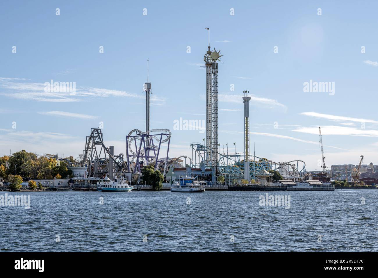 View of amusement park Grona Lund with carousels and tour rides on ...