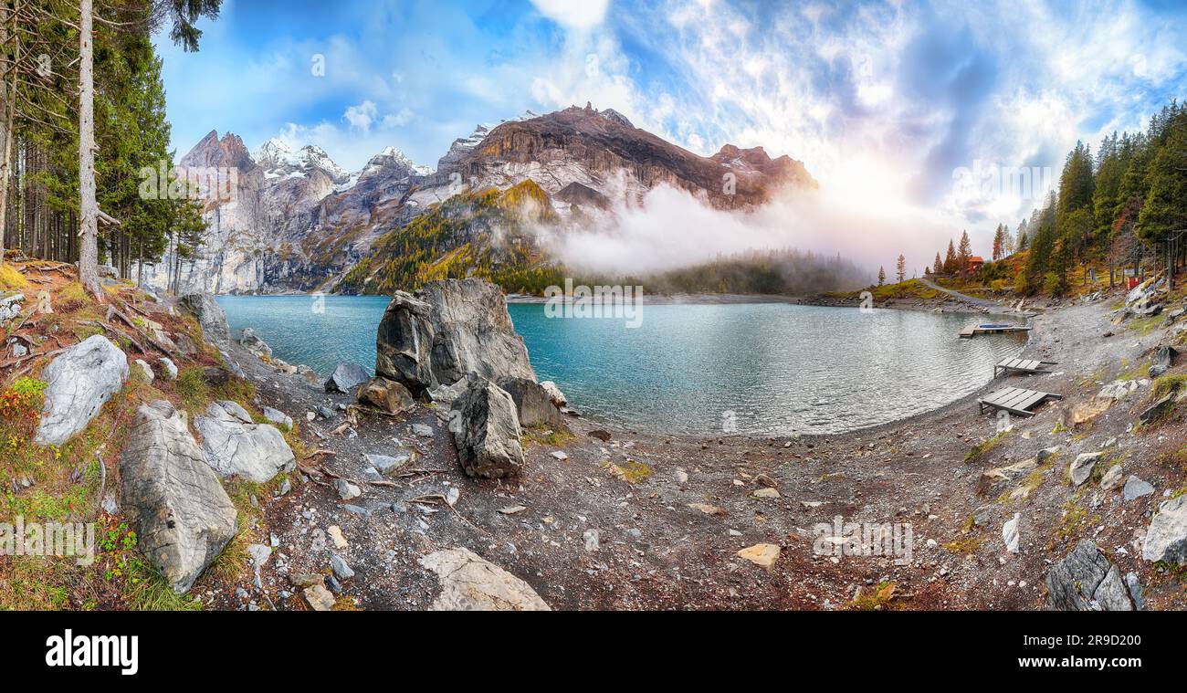 Incredible autumn view of Oeschinensee Lake. Scene of Swiss Alps with ...