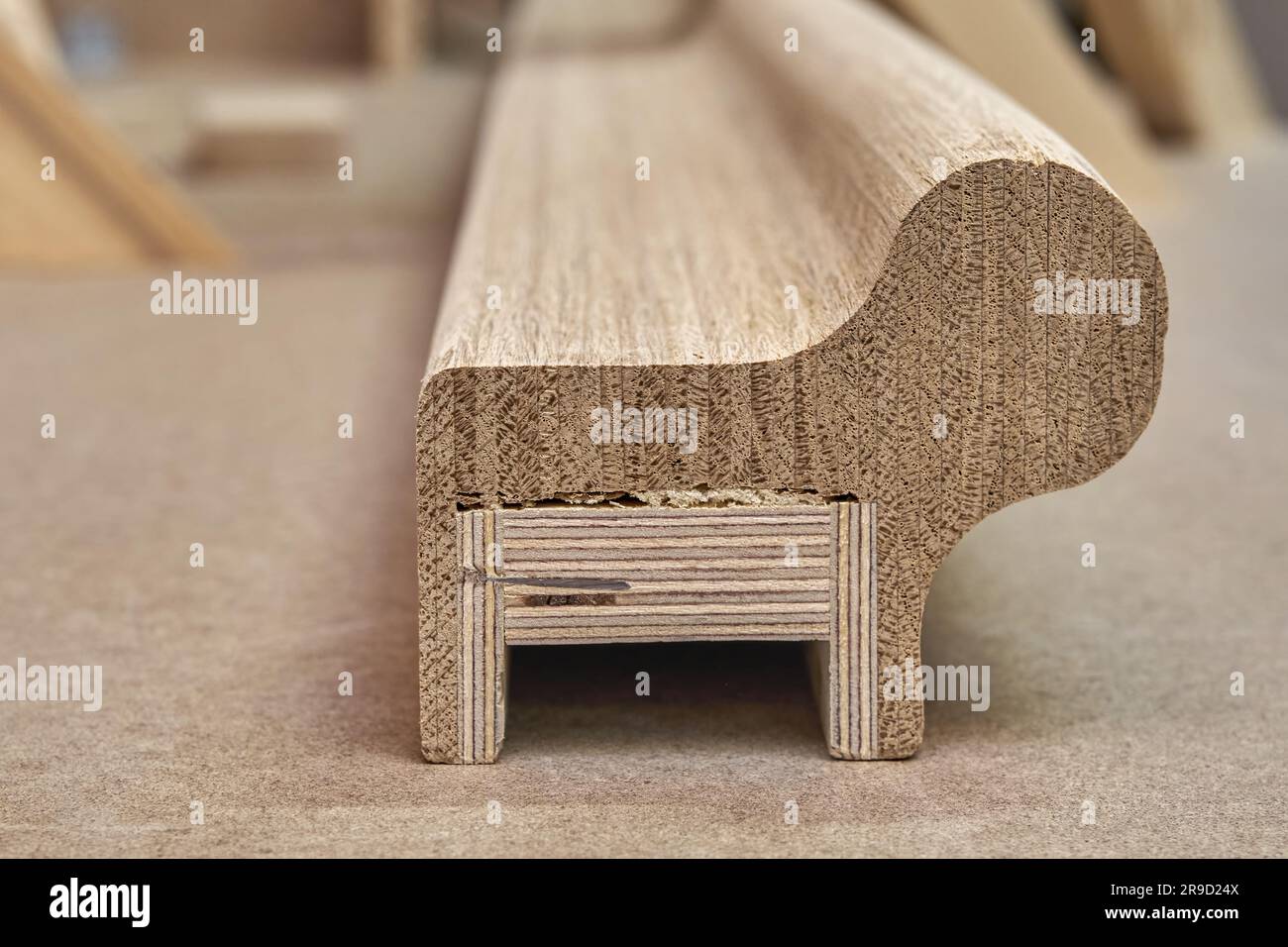 Irregular shape wooden staircase handrail made of oak planks and ...