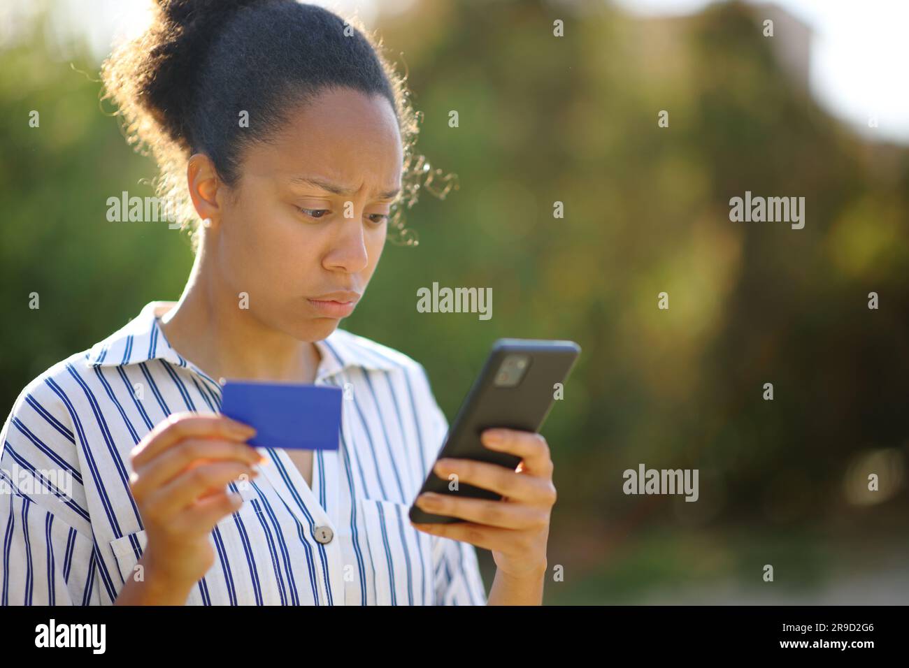 Credit card worry black woman hi-res stock photography and images - Alamy