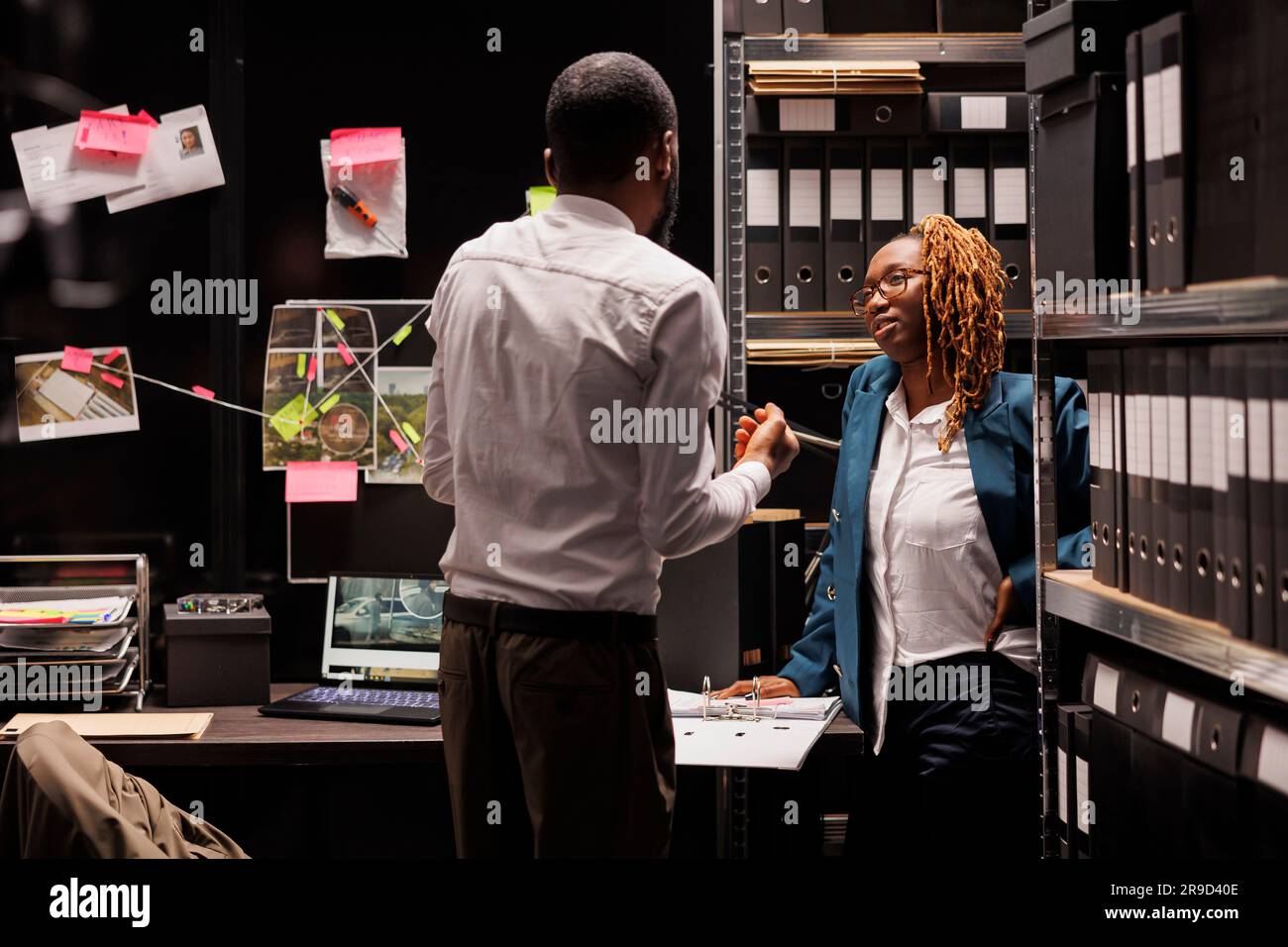 African american cops discussing investigation in detective office. Law ...