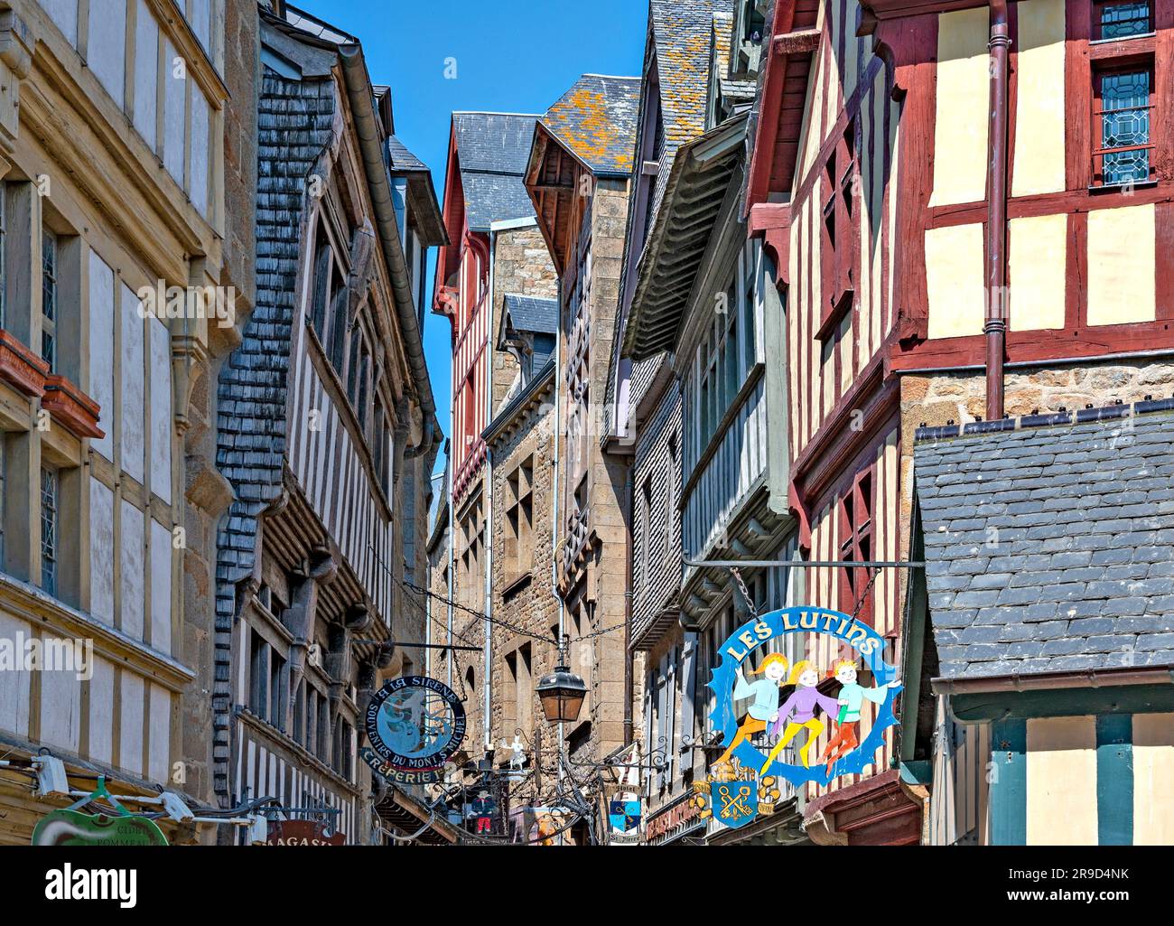 narrow street with medieval buildings at Mont-Saint-Michel in the ...