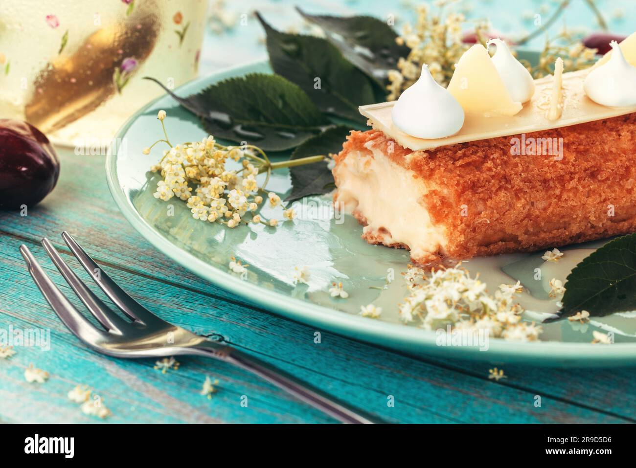 French eclair grazed with chocolate or sweet Italian profiteroles with ...