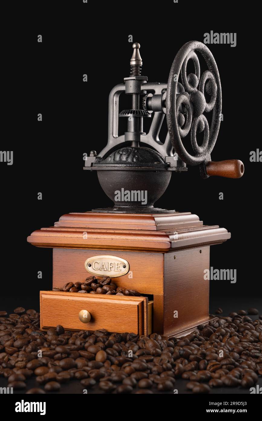 Vintage coffee grinder blender with cafe beans and aroma smoke isolated ...