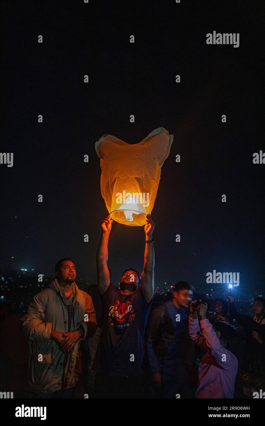 Dhaka Residents flying paper lantern (Fanush) on a rooftop of an ...
