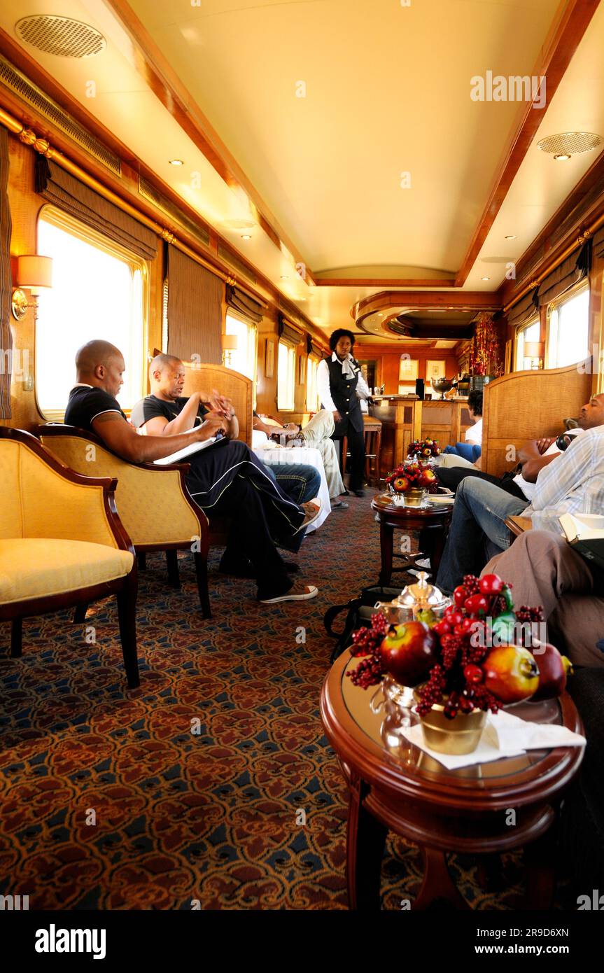 Passengers in the lounge, The Blue Train on route from Cape Town to ...
