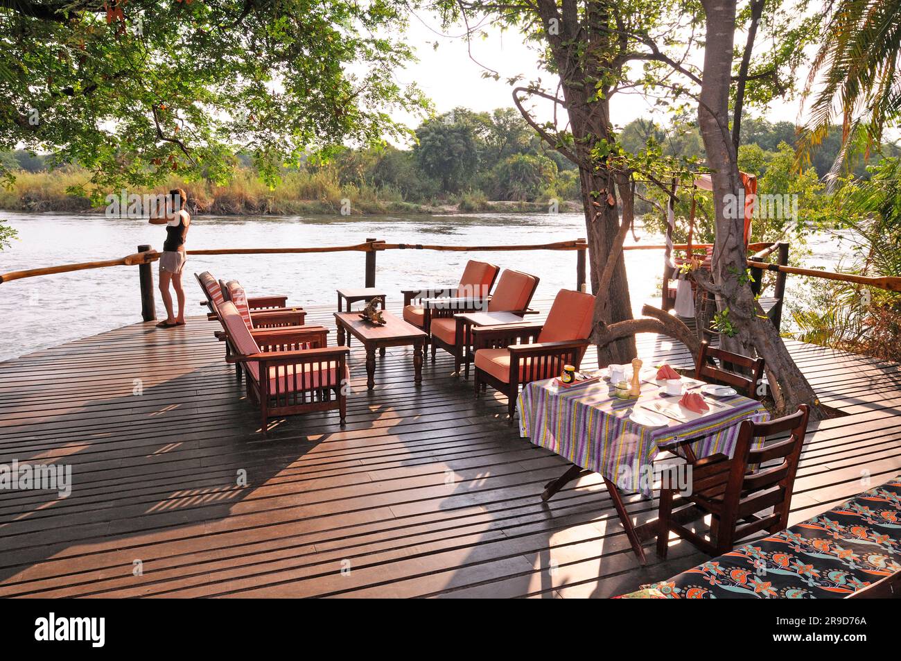 Breakfast set, Deck, Ntwala Island Lodge, Zambezi River, near Kasane ...