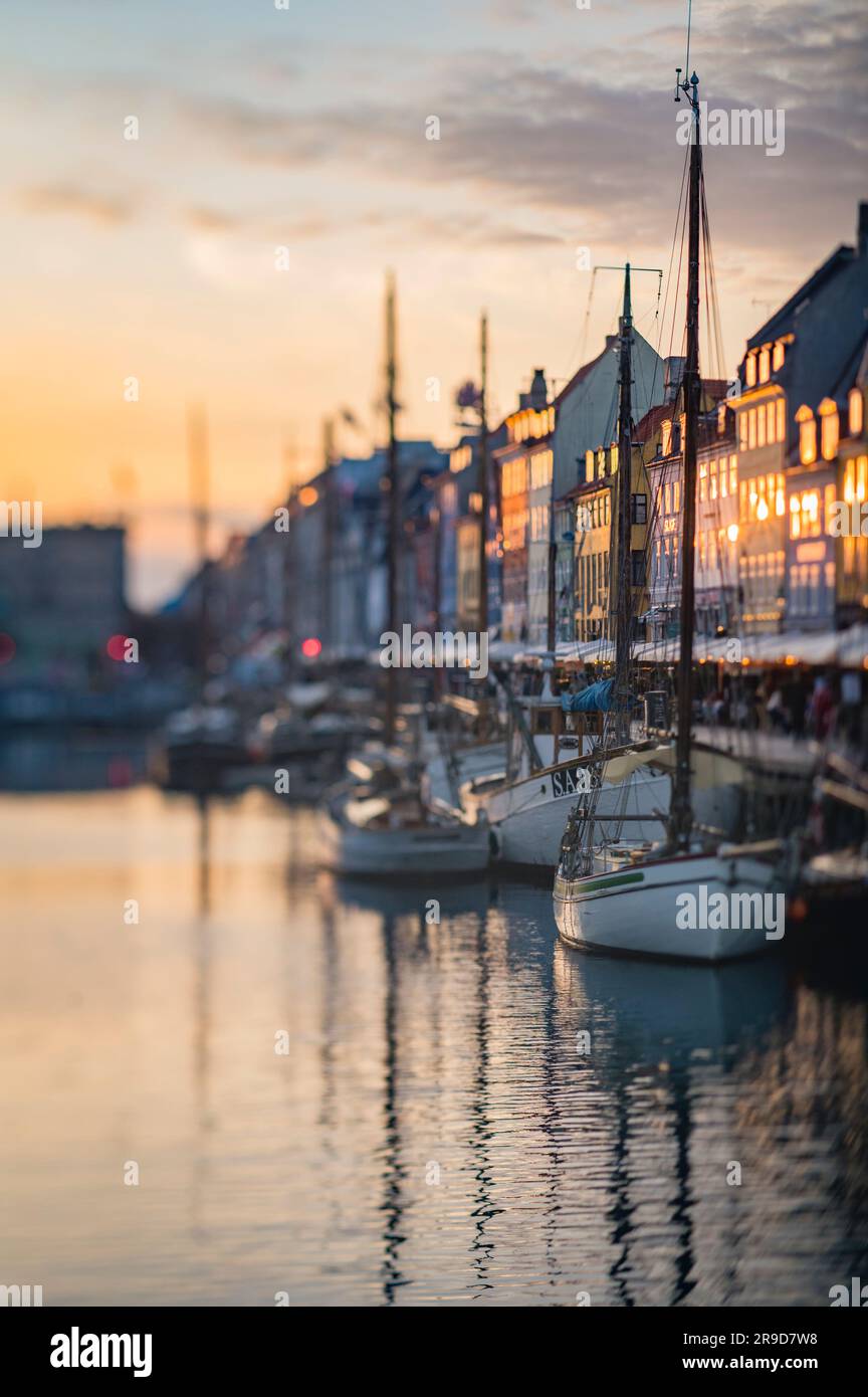 Sailboats during Golden Hour at Nyhavn Canal in Copenhagen, Denmark ...