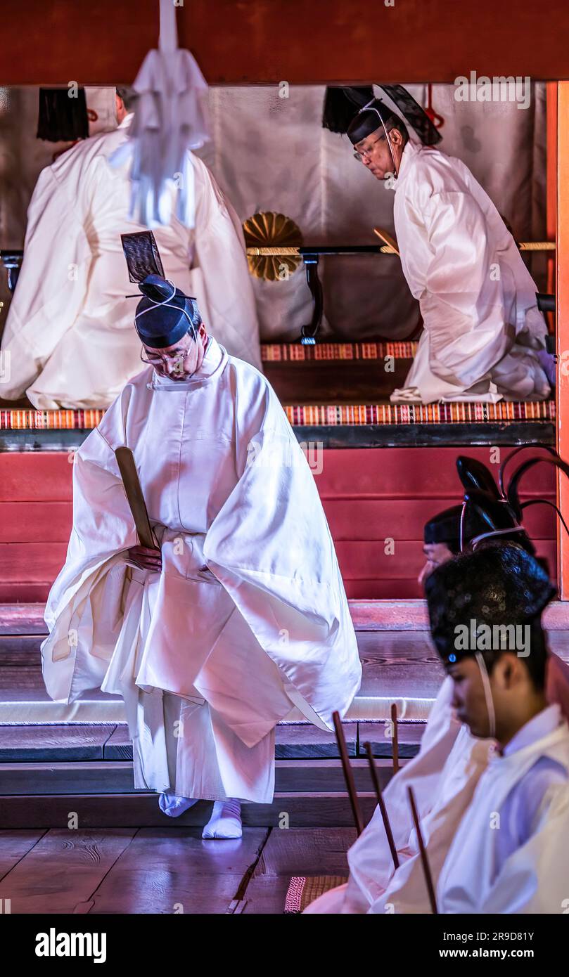Morning ritual at the Itsukushima shrine Stock Photo - Alamy