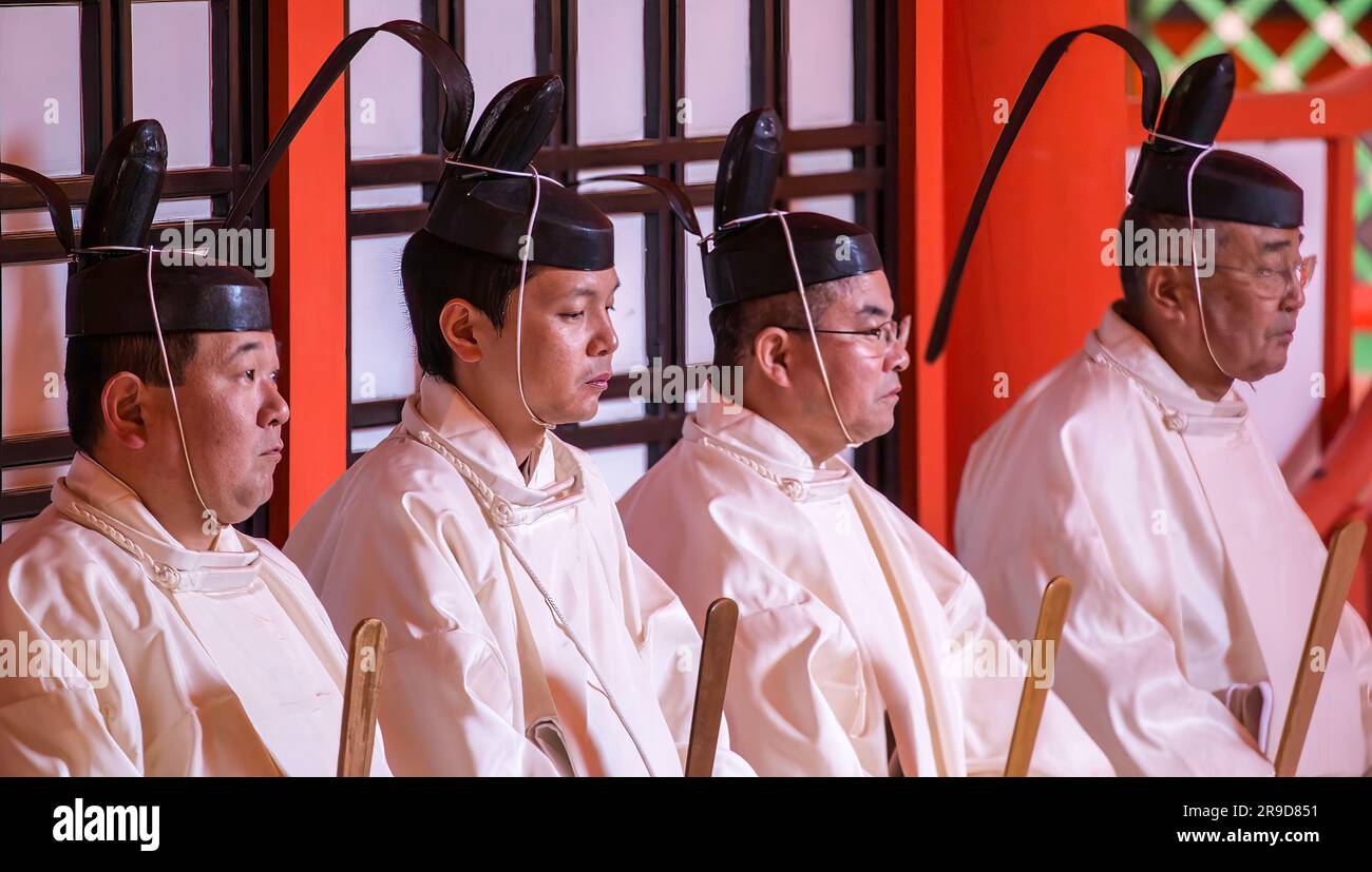 Morning ritual at the Itsukushima shrine Stock Photo - Alamy
