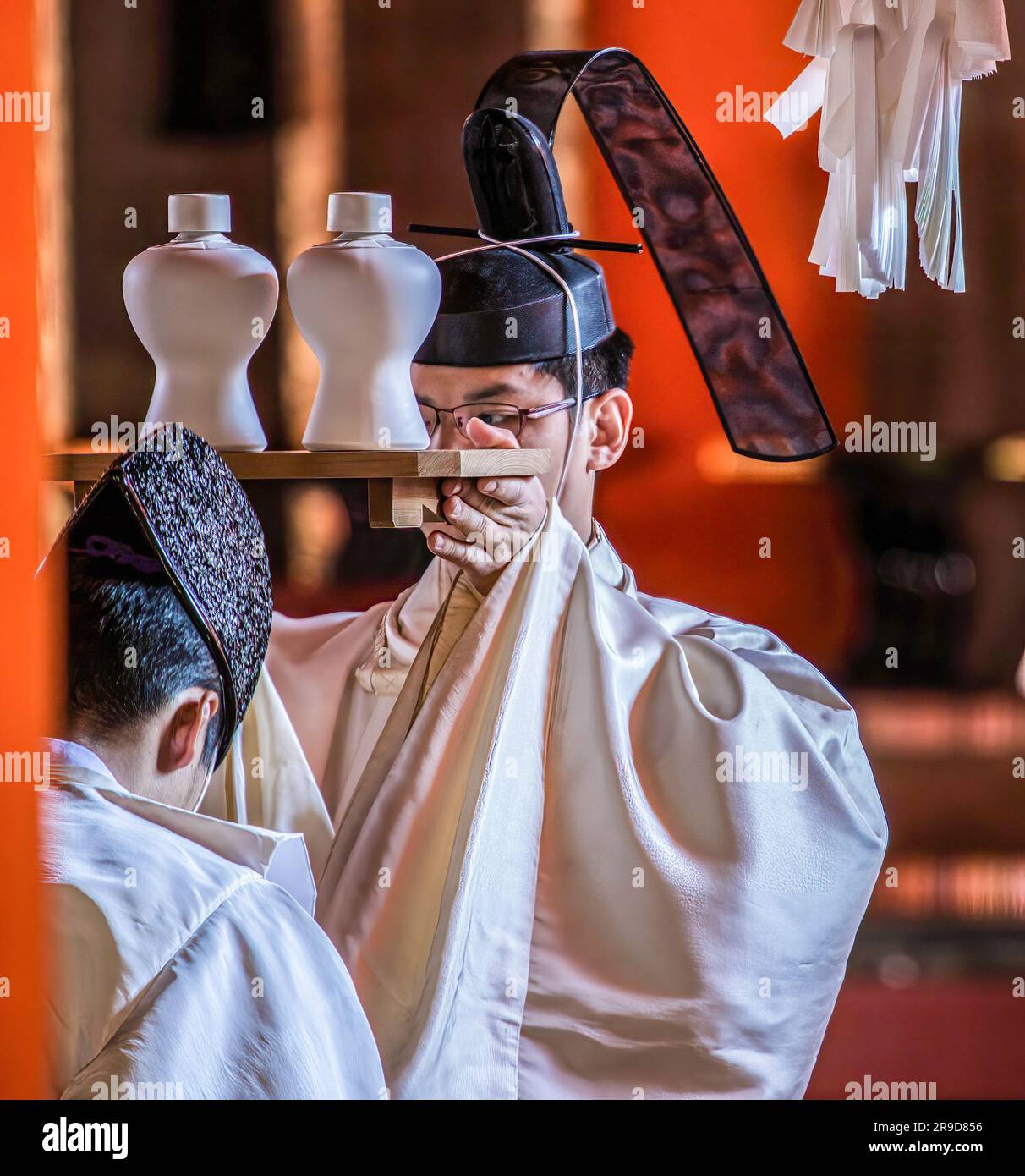 Morning ritual at the Itsukushima shrine Stock Photo - Alamy