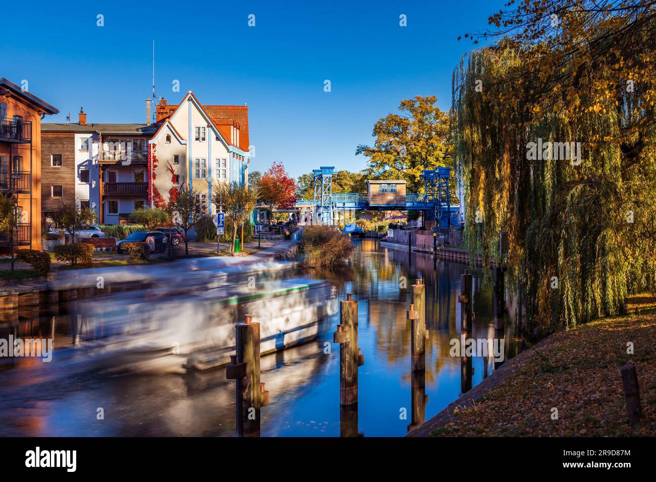 A boat driving to the lift bridge in Plau am See in the Mecklenburg ...