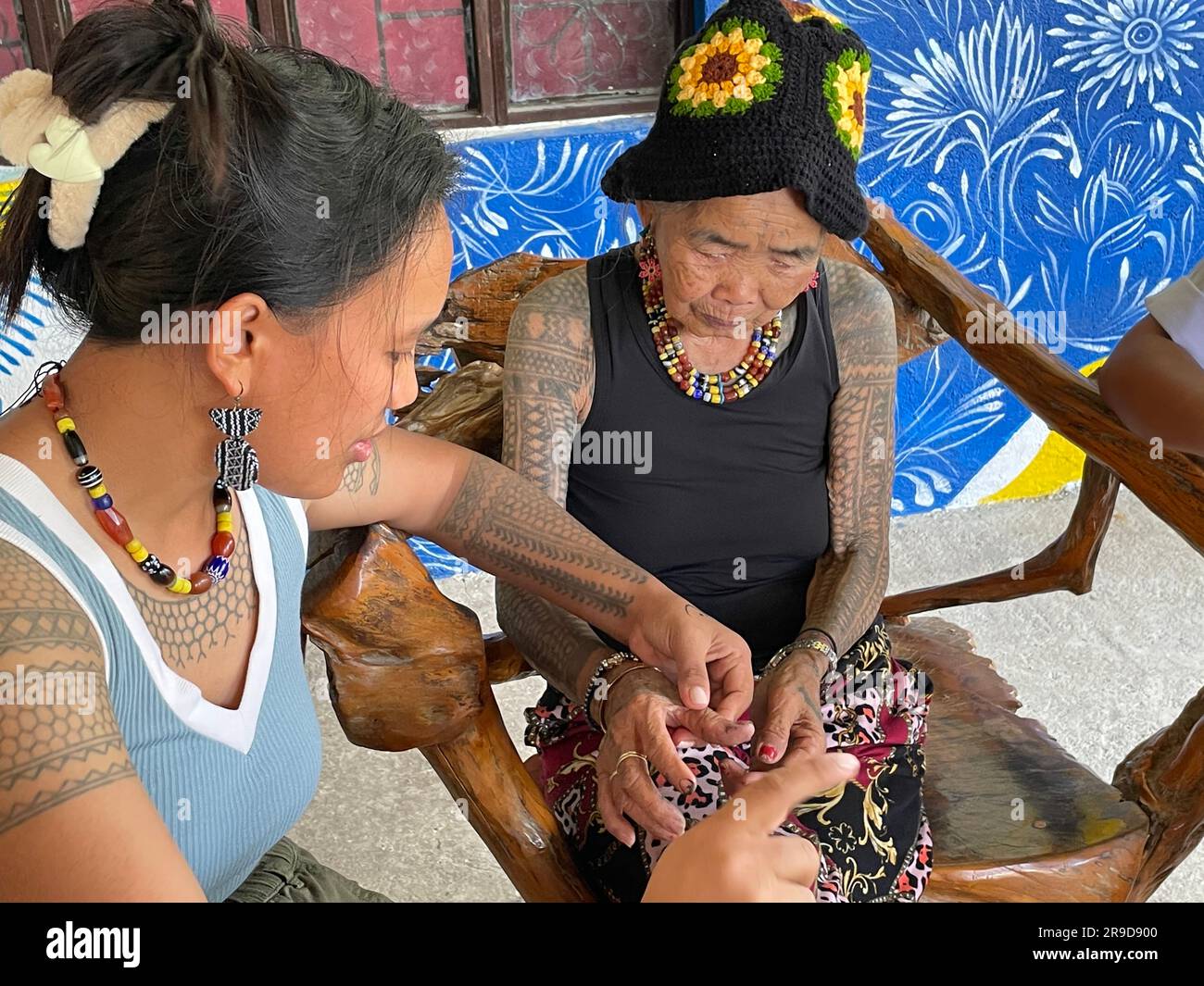 PRODUCTION - 24 May 2023, Philippines, Buscalan: Maria Oggay (r.), popularly known as Apo Whang ...