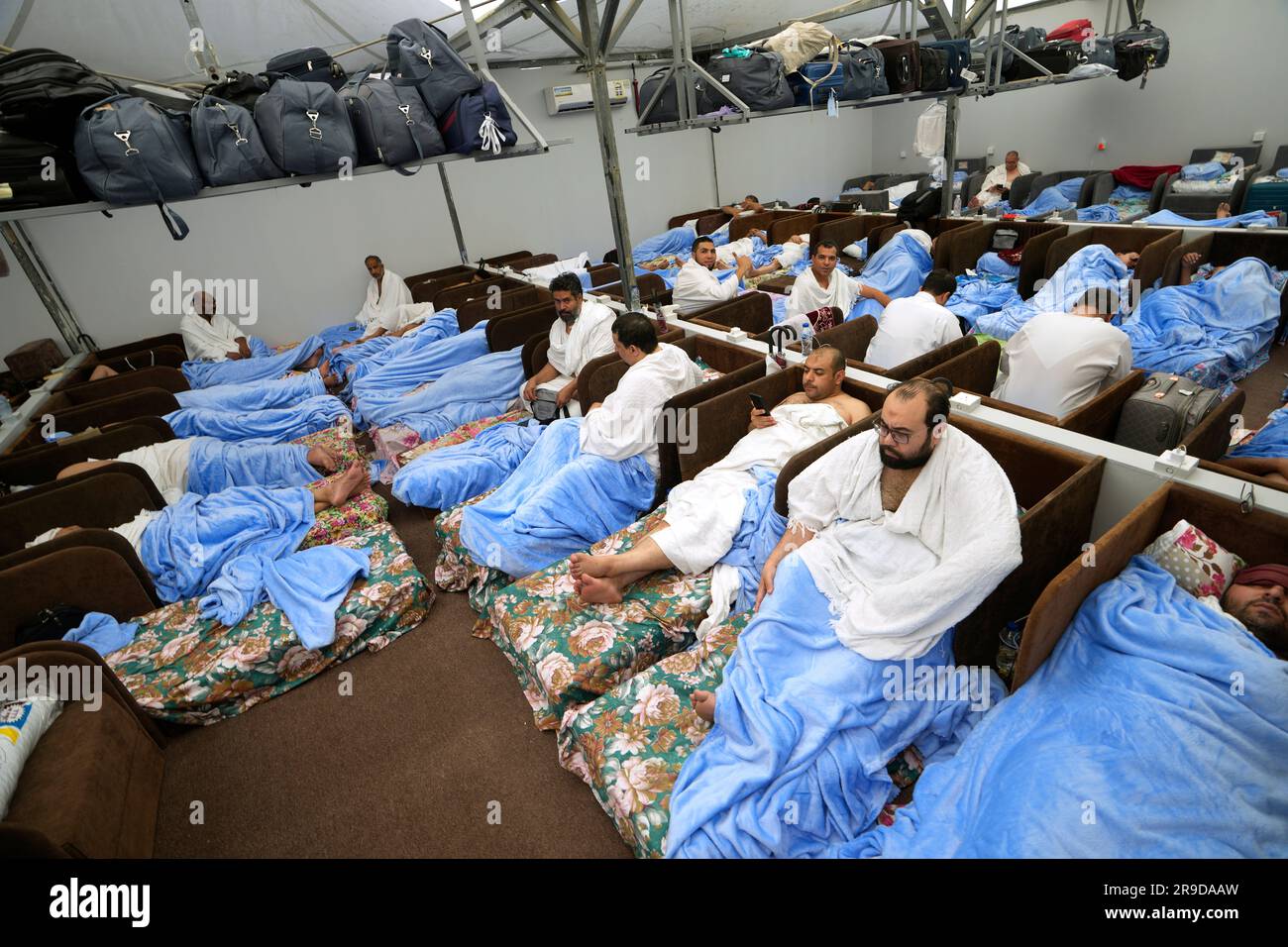 Muslim pilgrims rest at the Mina tent camp during the Hajj, in Mecca ...