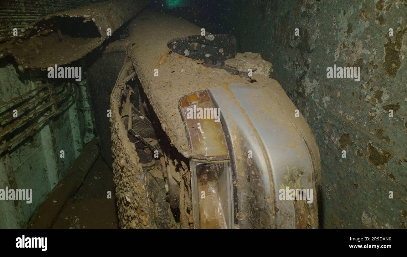 Red Sea, Egypt. 24th June, 2023. Car lying inside cramped hold of ferry ...