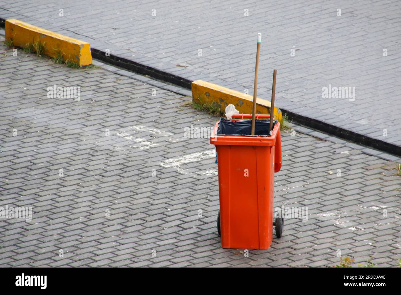colorful trash bin used in garbage collection - urban garbage ...