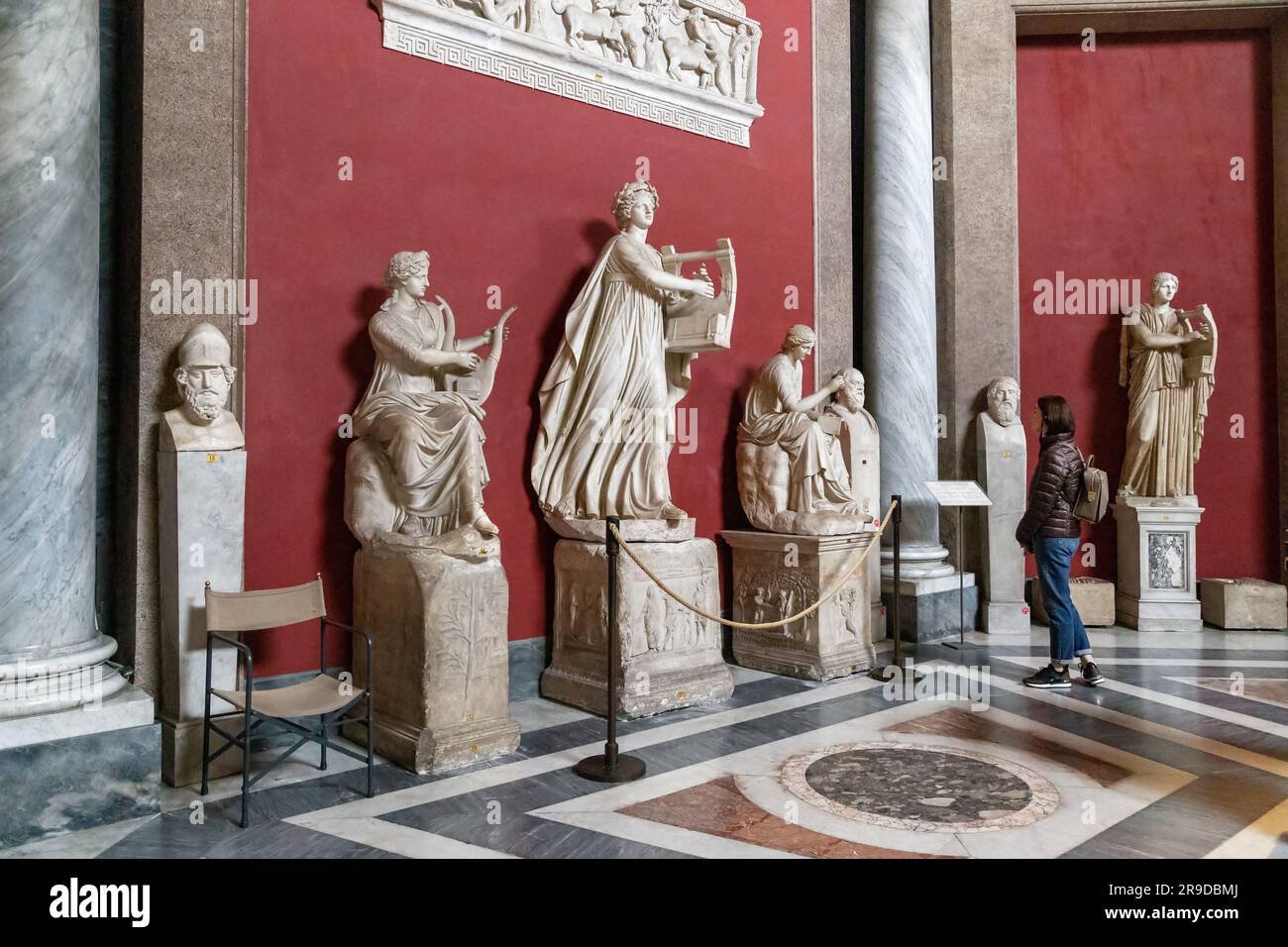 ROME, VATICAN - MARTH 9, 2023: An undefined visitor inspect collection ...