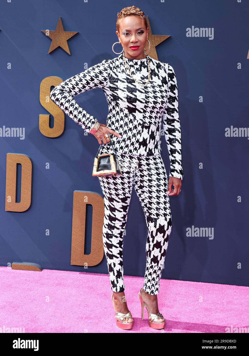 LOS ANGELES, CALIFORNIA, USA - JUNE 25: MC Lyte wearing Genny arrives ...