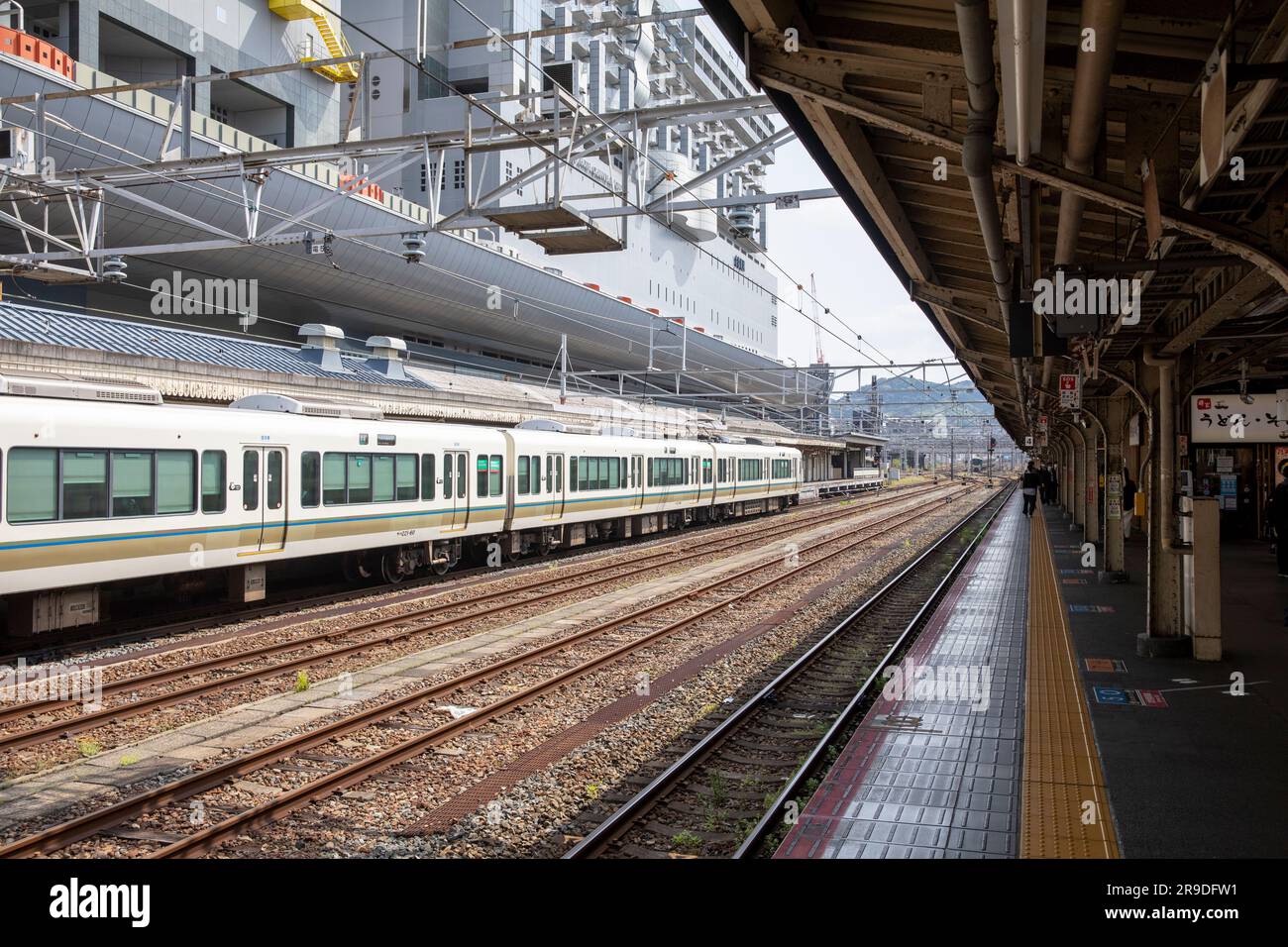 Kyoto railway station, rail carriage train stops at a platform,Kyoto ...