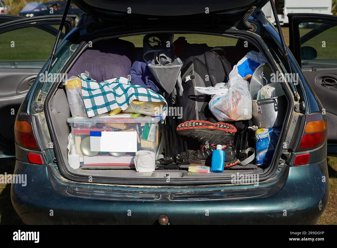 Car trunk with stuff for camping Stock Photo - Alamy